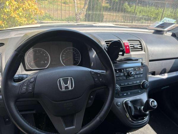 White Honda CR-V 2012 in Vilnius, with an engine capacity of 2.00 L and mileage of 95 thousand km for 11999 €, photo 11 on AUTOMOTO.COM.LV