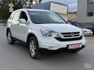 White Honda CR-V 2012 in Alytus, with an engine capacity of 2.20 L and mileage of 220 thousand km for 8499 €, photo 3 on AUTOMOTO.COM.LV