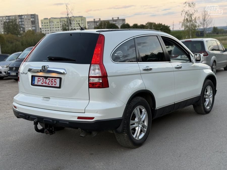 White Honda CR-V 2012 in Alytus, with an engine capacity of 2.20 L and mileage of 220 thousand km for 8499 €, photo 4 on AUTOMOTO.COM.LV