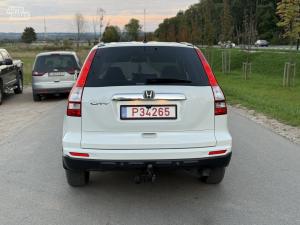 White Honda CR-V 2012 in Alytus, with an engine capacity of 2.20 L and mileage of 220 thousand km for 8499 €, photo 6 on AUTOMOTO.COM.LV