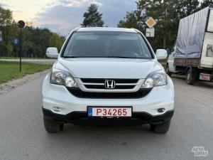 White Honda CR-V 2012 in Alytus, with an engine capacity of 2.20 L and mileage of 220 thousand km for 8499 €, photo 8 on AUTOMOTO.COM.LV