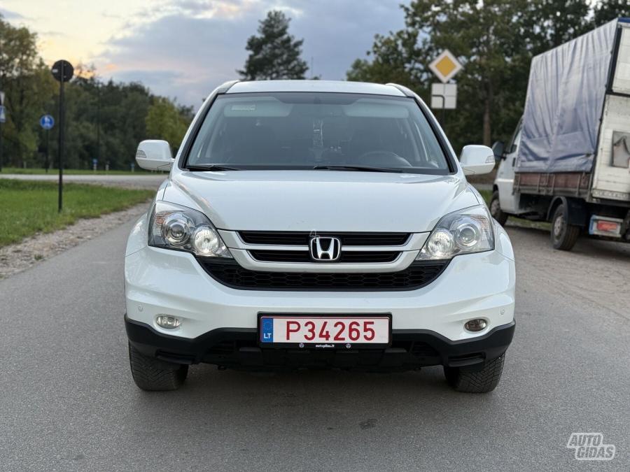 White Honda CR-V 2012 in Alytus, with an engine capacity of 2.20 L and mileage of 220 thousand km for 8499 €, photo 8 on AUTOMOTO.COM.LV