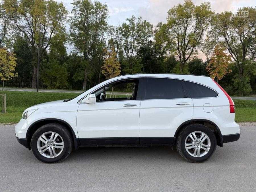 White Honda CR-V 2012 in Alytus, with an engine capacity of 2.20 L and mileage of 220 thousand km for 8499 €, photo 10 on AUTOMOTO.COM.LV