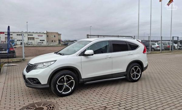 White Honda CR-V 2013 in Marijampole, with an engine capacity of 1.60 L and mileage of 161 thousand km for 10450 €, photo 4 on AUTOMOTO.COM.LV