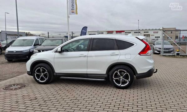 White Honda CR-V 2013 in Marijampole, with an engine capacity of 1.60 L and mileage of 161 thousand km for 10450 €, photo 6 on AUTOMOTO.COM.LV