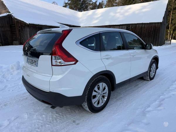 Balts Honda CR-V 2013 Tauragė, ar dzinēja tilpumu 2.20 L un nobraukumu 291 tūkst. km par 8000 €, foto 9 vietnē AUTOMOTO.COM.LV