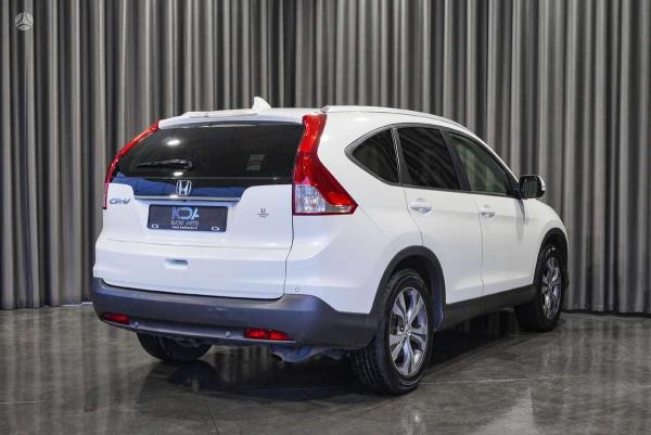 White Honda CR-V 2013 in Marijampole, with an engine capacity of 2.20 L and mileage of 195 thousand km for 9950 €, photo 11 on AUTOMOTO.COM.LV