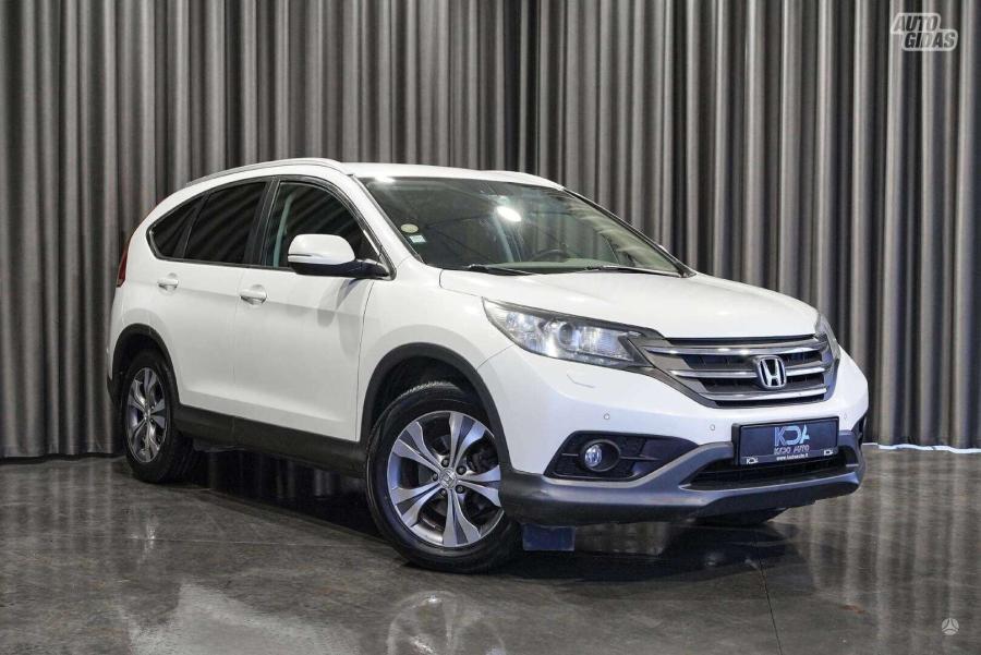 White Honda CR-V 2013 in Marijampole, with an engine capacity of 2.20 L and mileage of 195 thousand km for 9950 €, photo 1 on AUTOMOTO.COM.LV