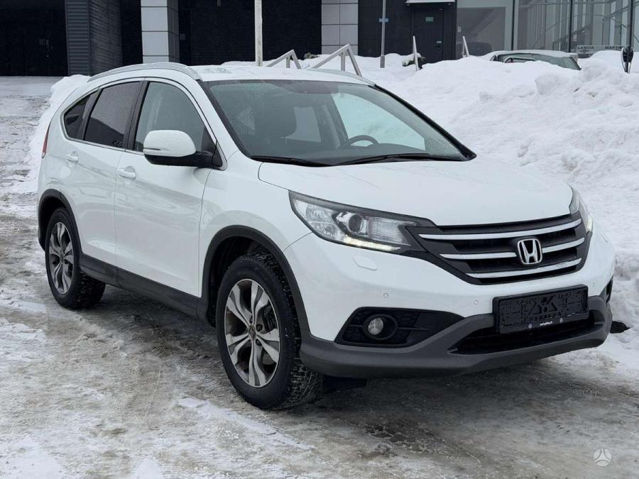 White Honda CR-V 2013 in Vilnius, with an engine capacity of 2.20 L and mileage of 169 thousand km for 11999 €, photo 7 on AUTOMOTO.COM.LV