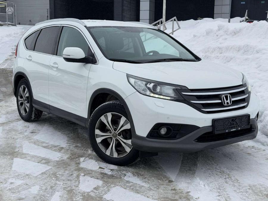 White Honda CR-V 2013 in Vilnius, with an engine capacity of 2.20 L and mileage of 169 thousand km for 11999 €, photo 8 on AUTOMOTO.COM.LV