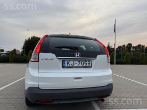 Balts Honda CR-V 2013 Rīga, ar dzinēja tilpumu 2.20 L un nobraukumu 143 tūkst. km par 13900 €, foto 5 vietnē AUTOMOTO.COM.LV