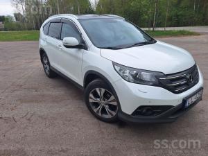 White Honda CR-V 2014 in Riga, with an engine capacity of 2.00 L and mileage of 249 thousand km for 12800 €, photo  on AUTOMOTO.COM.LV