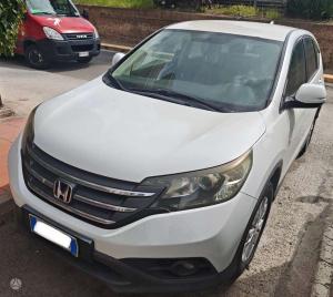 White Honda CR-V 2014 in Vilnius, with an engine capacity of 2.20 L and mileage of 240 thousand km for 10999 €, photo 3 on AUTOMOTO.COM.LV
