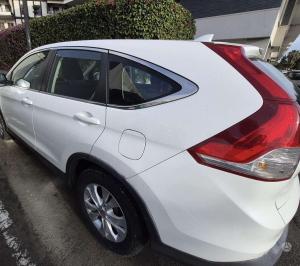 White Honda CR-V 2014 in Vilnius, with an engine capacity of 2.20 L and mileage of 240 thousand km for 10999 €, photo 4 on AUTOMOTO.COM.LV