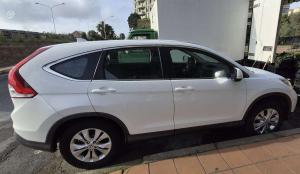 White Honda CR-V 2014 in Vilnius, with an engine capacity of 2.20 L and mileage of 240 thousand km for 10999 €, photo 5 on AUTOMOTO.COM.LV