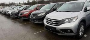 White Honda CR-V 2014 in Vilnius, with an engine capacity of 2.20 L and mileage of 240 thousand km for 10999 €, photo 13 on AUTOMOTO.COM.LV