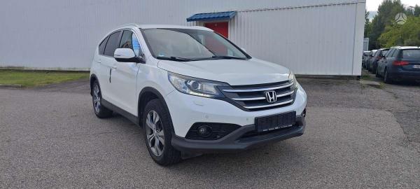 White Honda CR-V 2014 in Utena, with an engine capacity of 1.60 L and mileage of 289 thousand km for 7650 €, photo 8 on AUTOMOTO.COM.LV