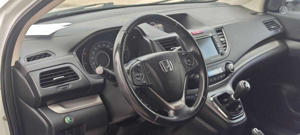 White Honda CR-V 2014 in Utena, with an engine capacity of 1.60 L and mileage of 289 thousand km for 7650 €, photo 11 on AUTOMOTO.COM.LV