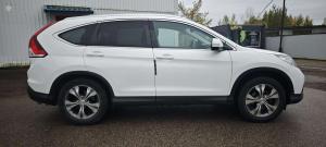 White Honda CR-V 2014 in Utena, with an engine capacity of 1.60 L and mileage of 289 thousand km for 7990 €, photo 7 on AUTOMOTO.COM.LV