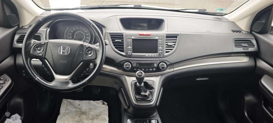 White Honda CR-V 2014 in Utena, with an engine capacity of 1.60 L and mileage of 289 thousand km for 7990 €, photo 21 on AUTOMOTO.COM.LV