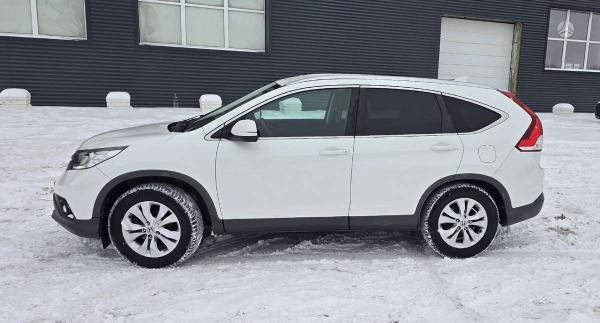 White Honda CR-V 2015 in Taurage, with an engine capacity of 1.60 L and mileage of 167 thousand km for 8600 €, photo 4 on AUTOMOTO.COM.LV