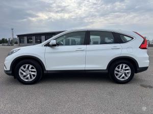 White Honda CR-V 2015 in Panevezys, with an engine capacity of 1.60 L and mileage of 117 thousand km for 12999 €, photo 5 on AUTOMOTO.COM.LV