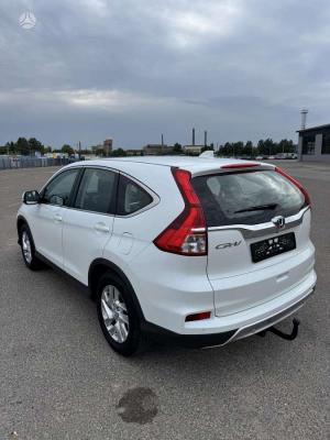 White Honda CR-V 2015 in Panevezys, with an engine capacity of 1.60 L and mileage of 117 thousand km for 12999 €, photo 6 on AUTOMOTO.COM.LV
