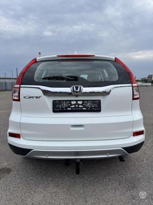 White Honda CR-V 2015 in Panevezys, with an engine capacity of 1.60 L and mileage of 117 thousand km for 12999 €, photo 7 on AUTOMOTO.COM.LV