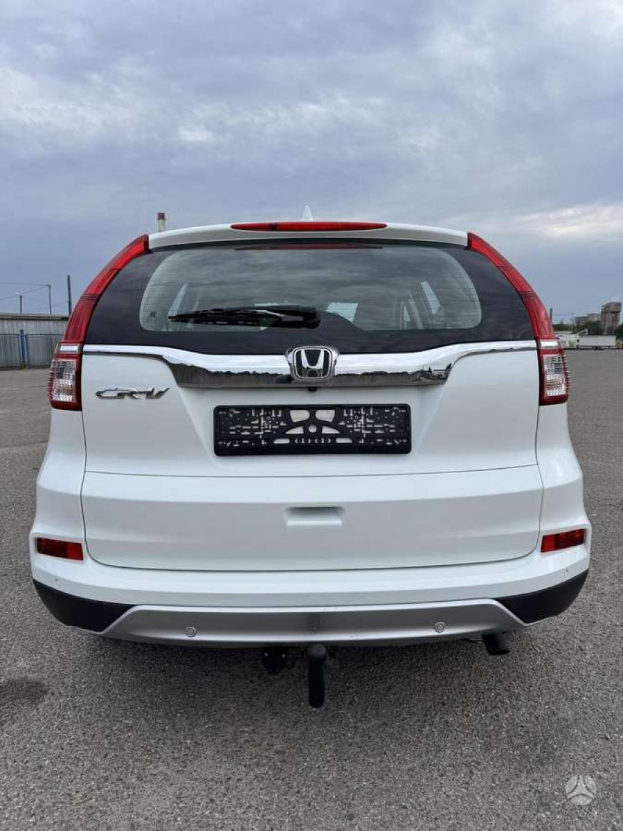 White Honda CR-V 2015 in Panevezys, with an engine capacity of 1.60 L and mileage of 117 thousand km for 12999 €, photo 7 on AUTOMOTO.COM.LV