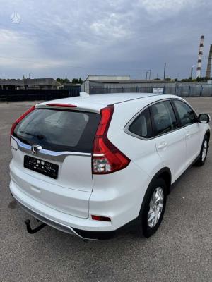 White Honda CR-V 2015 in Panevezys, with an engine capacity of 1.60 L and mileage of 117 thousand km for 12999 €, photo 8 on AUTOMOTO.COM.LV