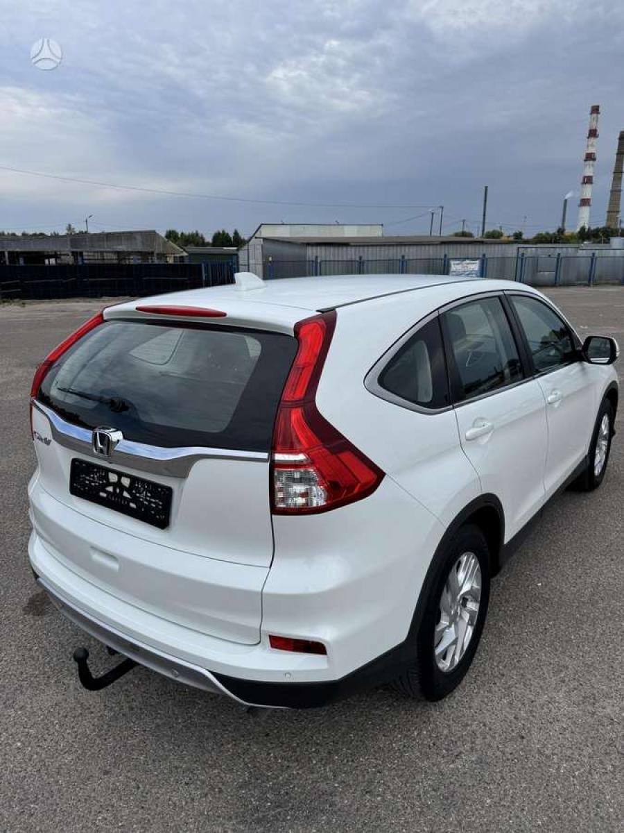 White Honda CR-V 2015 in Panevezys, with an engine capacity of 1.60 L and mileage of 117 thousand km for 12999 €, photo 8 on AUTOMOTO.COM.LV