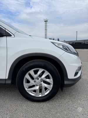 White Honda CR-V 2015 in Panevezys, with an engine capacity of 1.60 L and mileage of 117 thousand km for 12999 €, photo 10 on AUTOMOTO.COM.LV