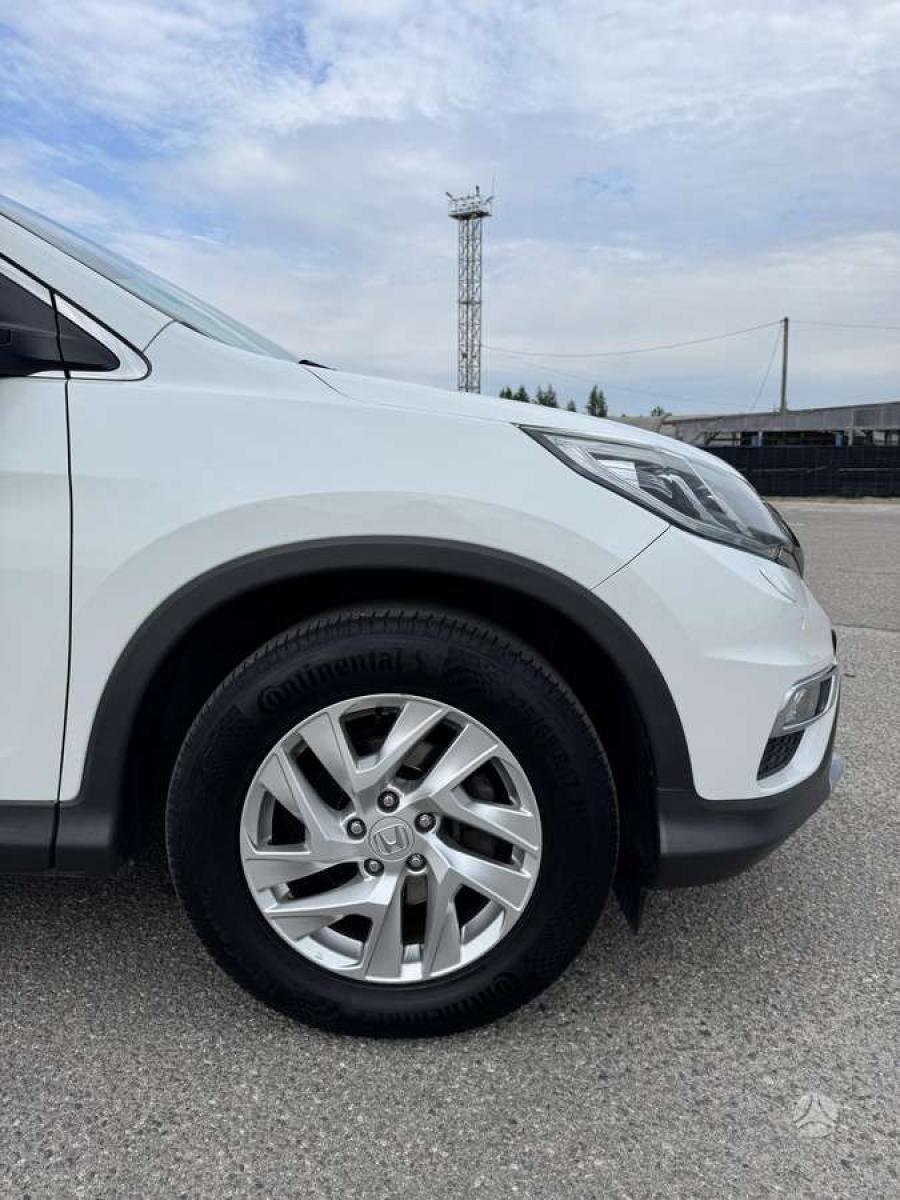 White Honda CR-V 2015 in Panevezys, with an engine capacity of 1.60 L and mileage of 117 thousand km for 12999 €, photo 10 on AUTOMOTO.COM.LV