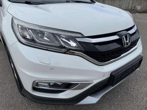 White Honda CR-V 2015 in Panevezys, with an engine capacity of 1.60 L and mileage of 117 thousand km for 12999 €, photo 11 on AUTOMOTO.COM.LV