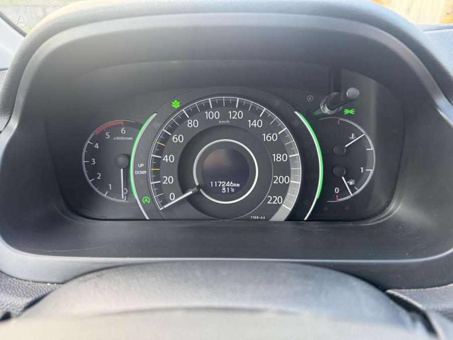White Honda CR-V 2015 in Panevezys, with an engine capacity of 1.60 L and mileage of 117 thousand km for 12999 €, photo 14 on AUTOMOTO.COM.LV