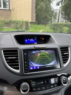 White Honda CR-V 2015 in Panevezys, with an engine capacity of 1.60 L and mileage of 117 thousand km for 12999 €, photo 15 on AUTOMOTO.COM.LV