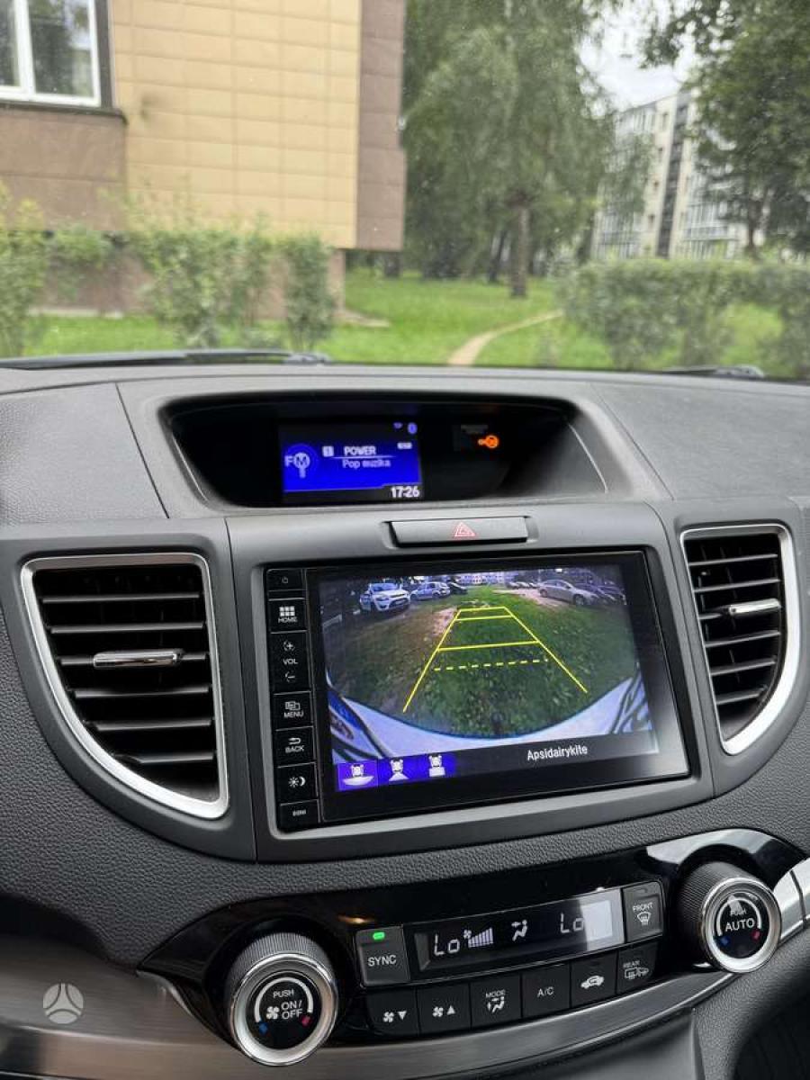 White Honda CR-V 2015 in Panevezys, with an engine capacity of 1.60 L and mileage of 117 thousand km for 12999 €, photo 15 on AUTOMOTO.COM.LV