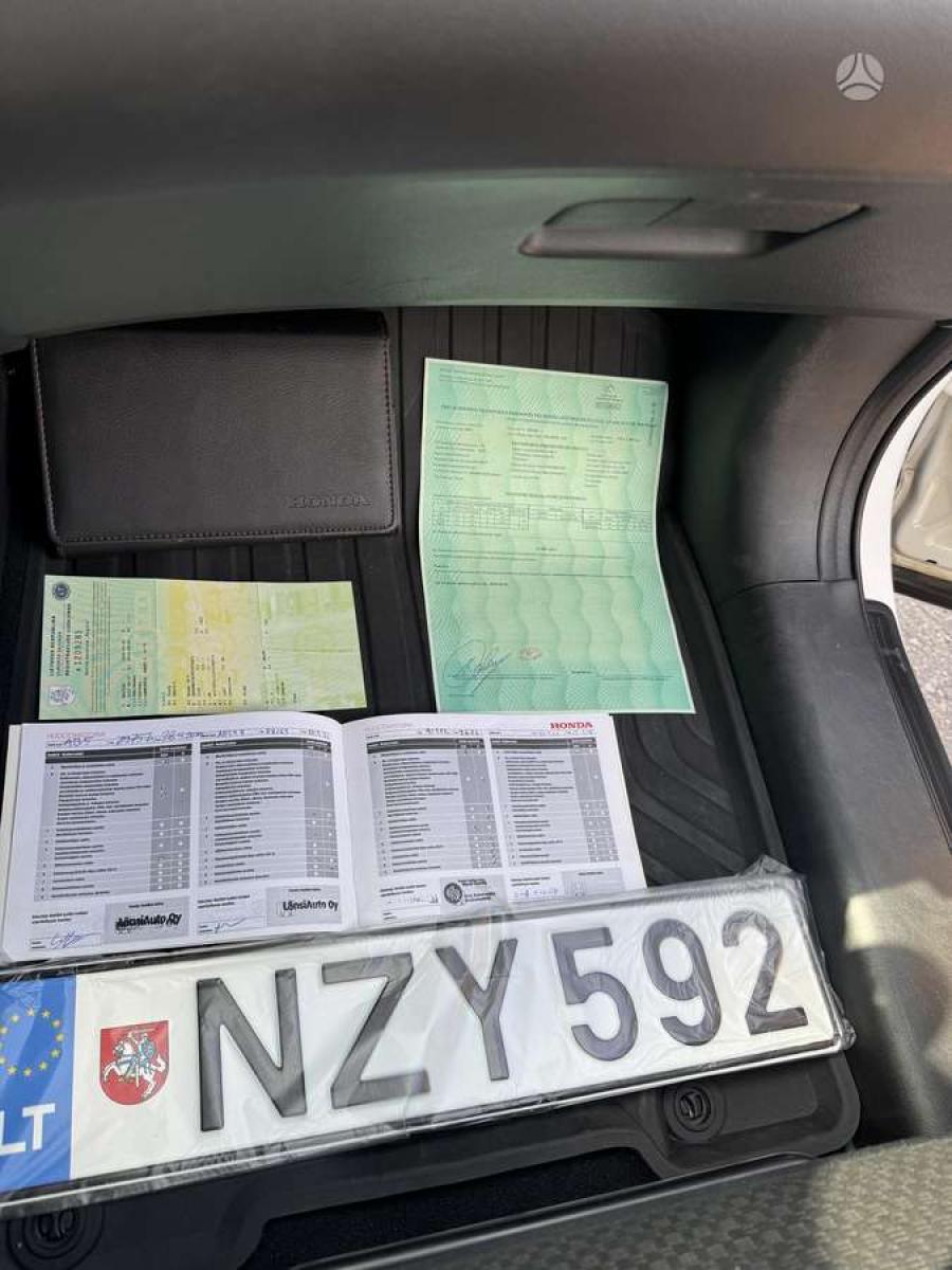 White Honda CR-V 2015 in Panevezys, with an engine capacity of 1.60 L and mileage of 117 thousand km for 12999 €, photo 19 on AUTOMOTO.COM.LV