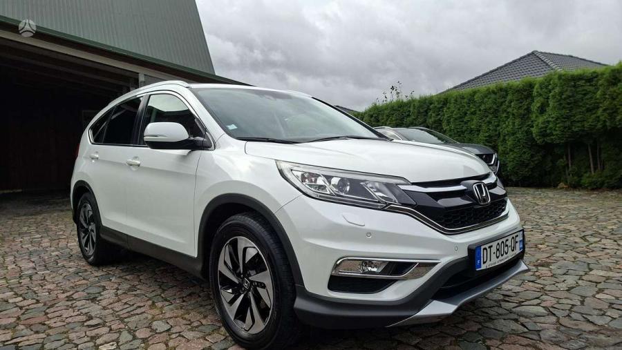 White Honda CR-V 2015 in Kaunas, with an engine capacity of 1.60 L and mileage of 245 thousand km for 11050 €, photo 4 on AUTOMOTO.COM.LV