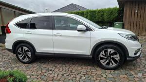 White Honda CR-V 2015 in Kaunas, with an engine capacity of 1.60 L and mileage of 245 thousand km for 11050 €, photo 31 on AUTOMOTO.COM.LV