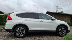 White Honda CR-V 2015 in Kaunas, with an engine capacity of 1.60 L and mileage of 245 thousand km for 11050 €, photo 33 on AUTOMOTO.COM.LV