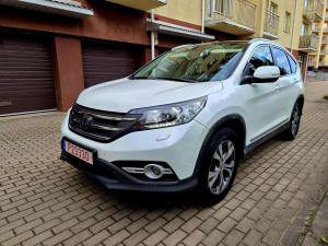 White Honda CR-V 2015 in Vilnius, with an engine capacity of 2.20 L and mileage of 232 thousand km for 12999 €, photo 4 on AUTOMOTO.COM.LV