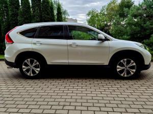 White Honda CR-V 2015 in Vilnius, with an engine capacity of 2.20 L and mileage of 232 thousand km for 12999 €, photo 5 on AUTOMOTO.COM.LV