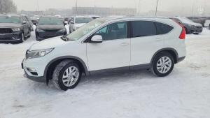 White Honda CR-V 2016 in Siauliai, with an engine capacity of 1.60 L and mileage of 231 thousand km for 14400 €, photo 4 on AUTOMOTO.COM.LV