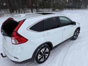 White Honda CR-V 2016 in Kaunas, with an engine capacity of 1.60 L and mileage of 209 thousand km for 15999 €, photo 7 on AUTOMOTO.COM.LV