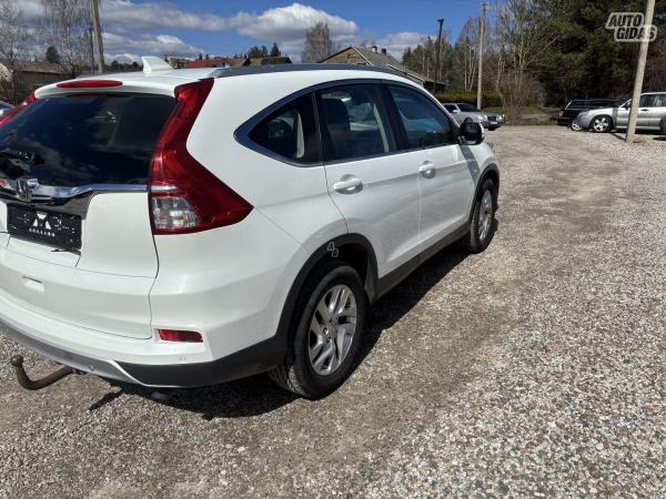 White Honda CR-V 2016 in Jurbarkas, with an engine capacity of 1.60 L and mileage of 130 thousand km for 10800 €, photo 8 on AUTOMOTO.COM.LV