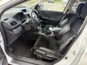 White Honda CR-V 2016 in Riga, with an engine capacity of 1.60 L and mileage of 145 thousand km for 12450 €, photo 9 on AUTOMOTO.COM.LV