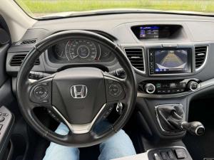 White Honda CR-V 2016 in Riga, with an engine capacity of 1.60 L and mileage of 145 thousand km for 12950 €, photo 11 on AUTOMOTO.COM.LV