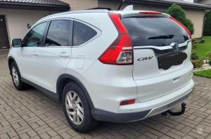White Honda CR-V 2016 in Panevezys, with an engine capacity of 1.60 L and mileage of 219 thousand km for 9950 €, photo 4 on AUTOMOTO.COM.LV