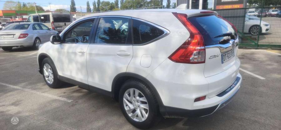 White Honda CR-V 2016 in Klaipeda, with an engine capacity of 1.60 L and mileage of 275 thousand km for 10400 €, photo 15 on AUTOMOTO.COM.LV